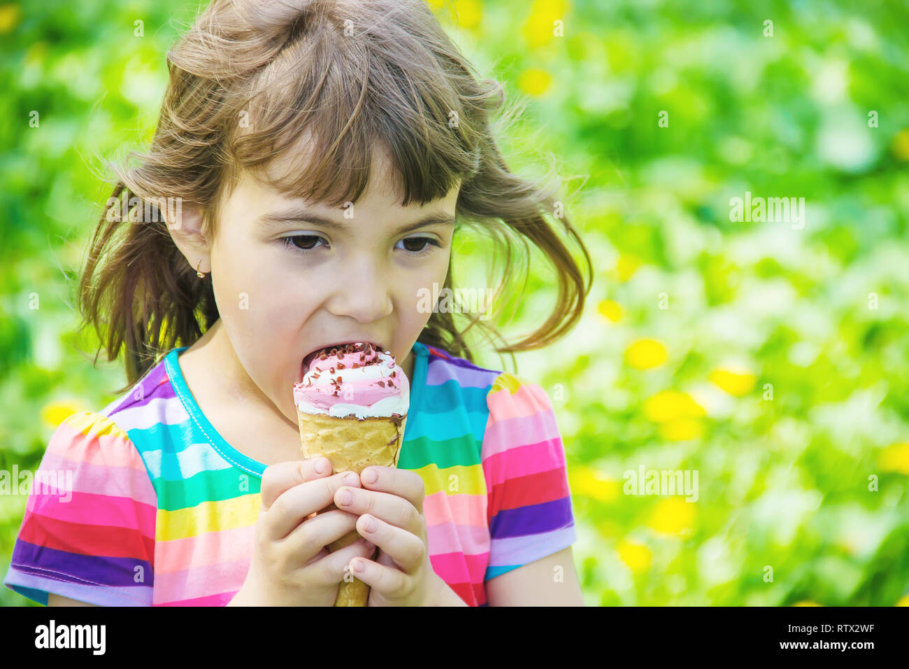 Child girl eats ice cream hi-res stock photography and images - Alamy