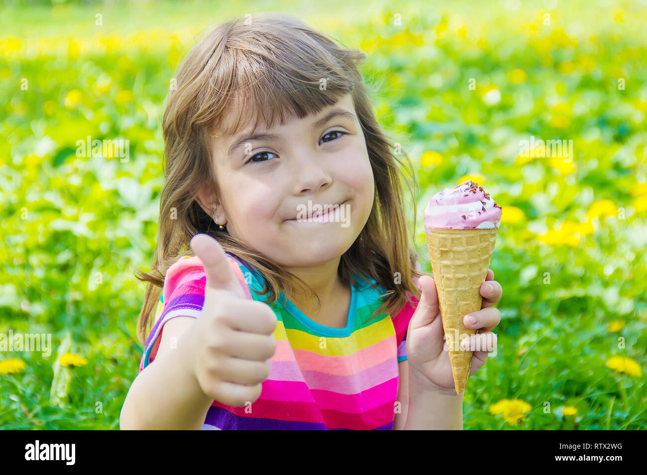 Child girl eats ice cream hi-res stock photography and images - Alamy