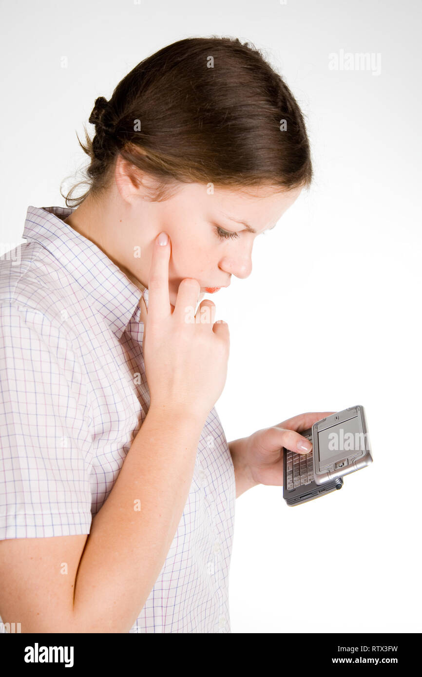 pretty girl with a smartphone on white and grey background Stock Photo ...