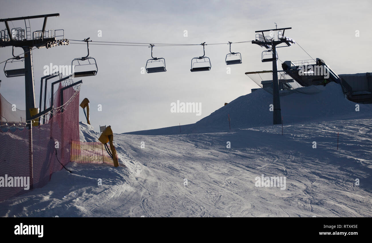 Ski lift in italian Dolomites Stock Photo - Alamy