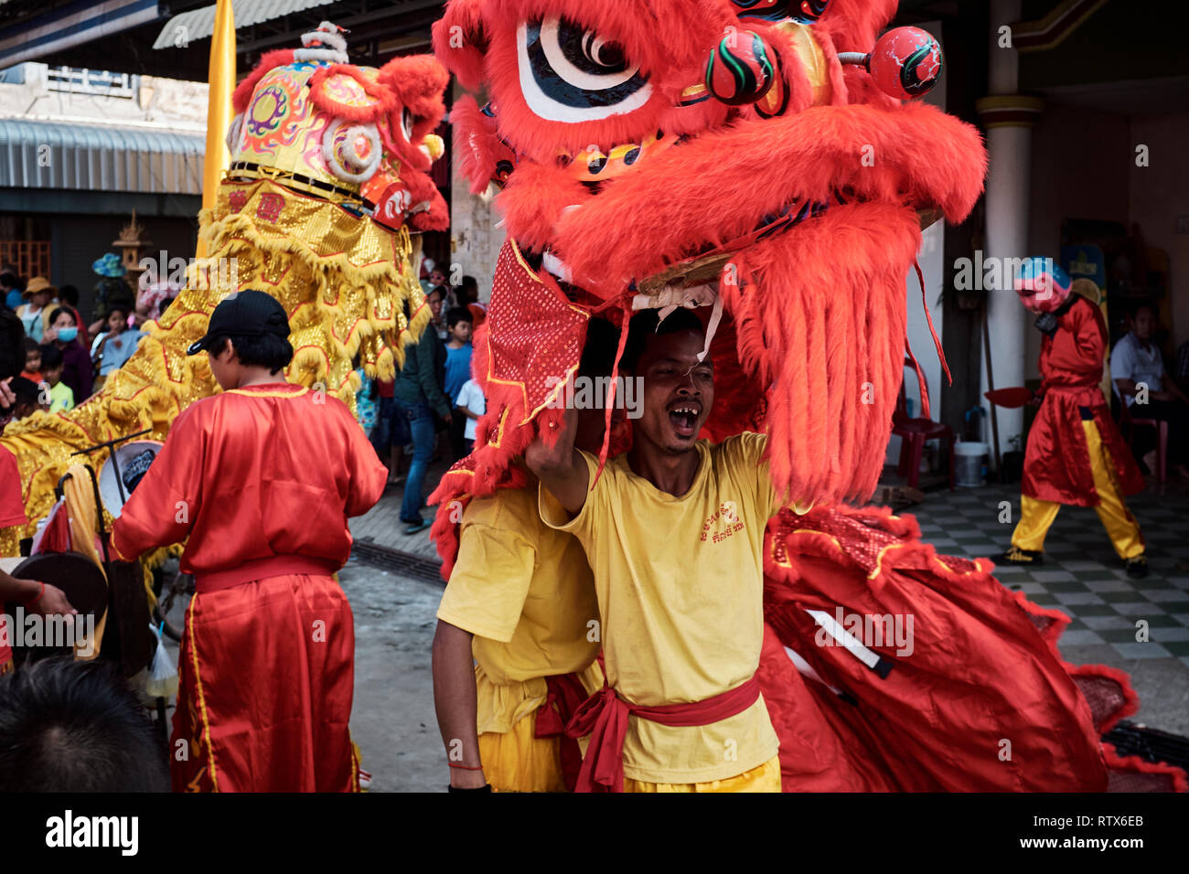 Dragon dancers usher in the new year by performing a dance ritual ...