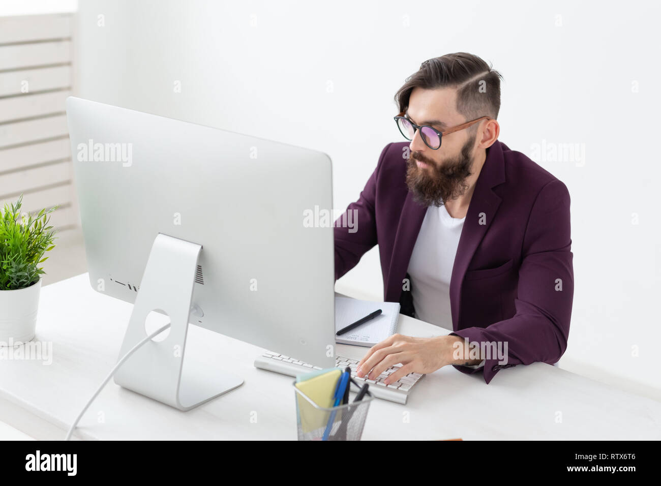 people, design and style concept - graphic designer sketching new ...