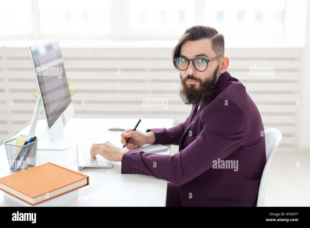 people, design and style concept - graphic designer sketching new ...