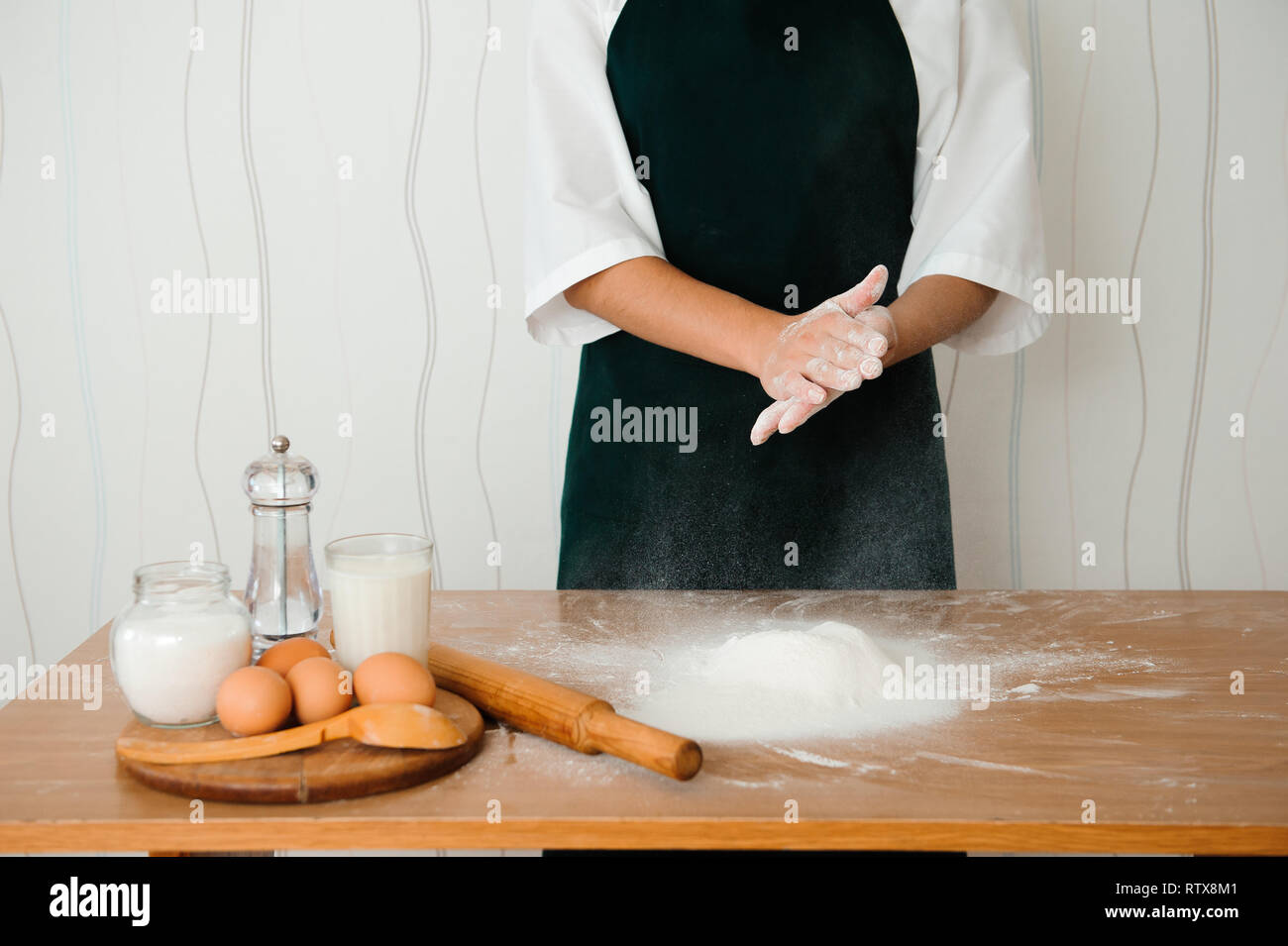Chef preparing dough - cooking process, work with flour Stock Photo - Alamy
