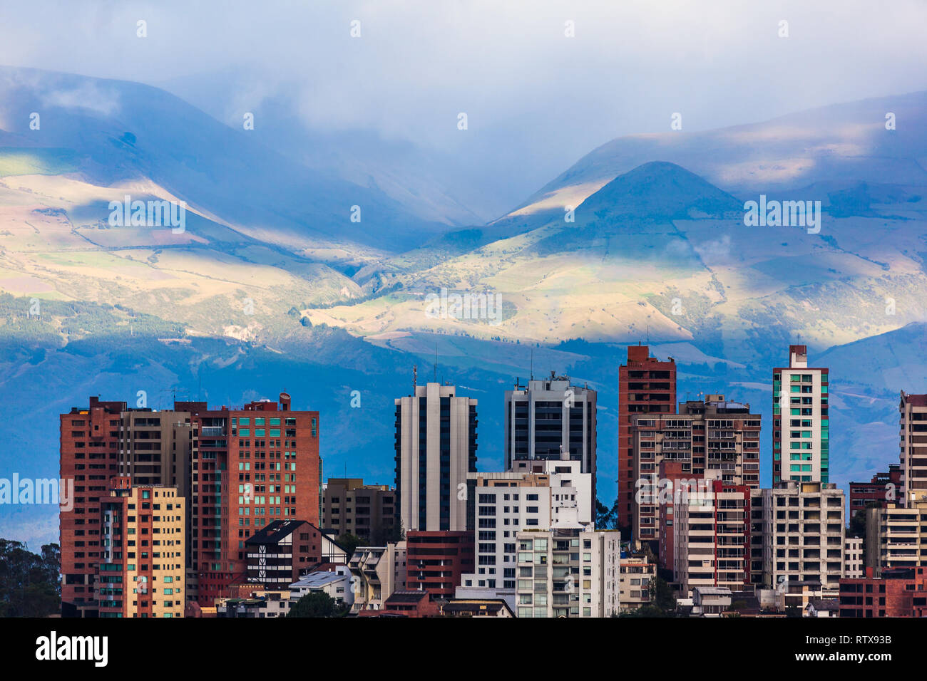 Modern buildings of Quito with the Andes in the background Stock Photo ...
