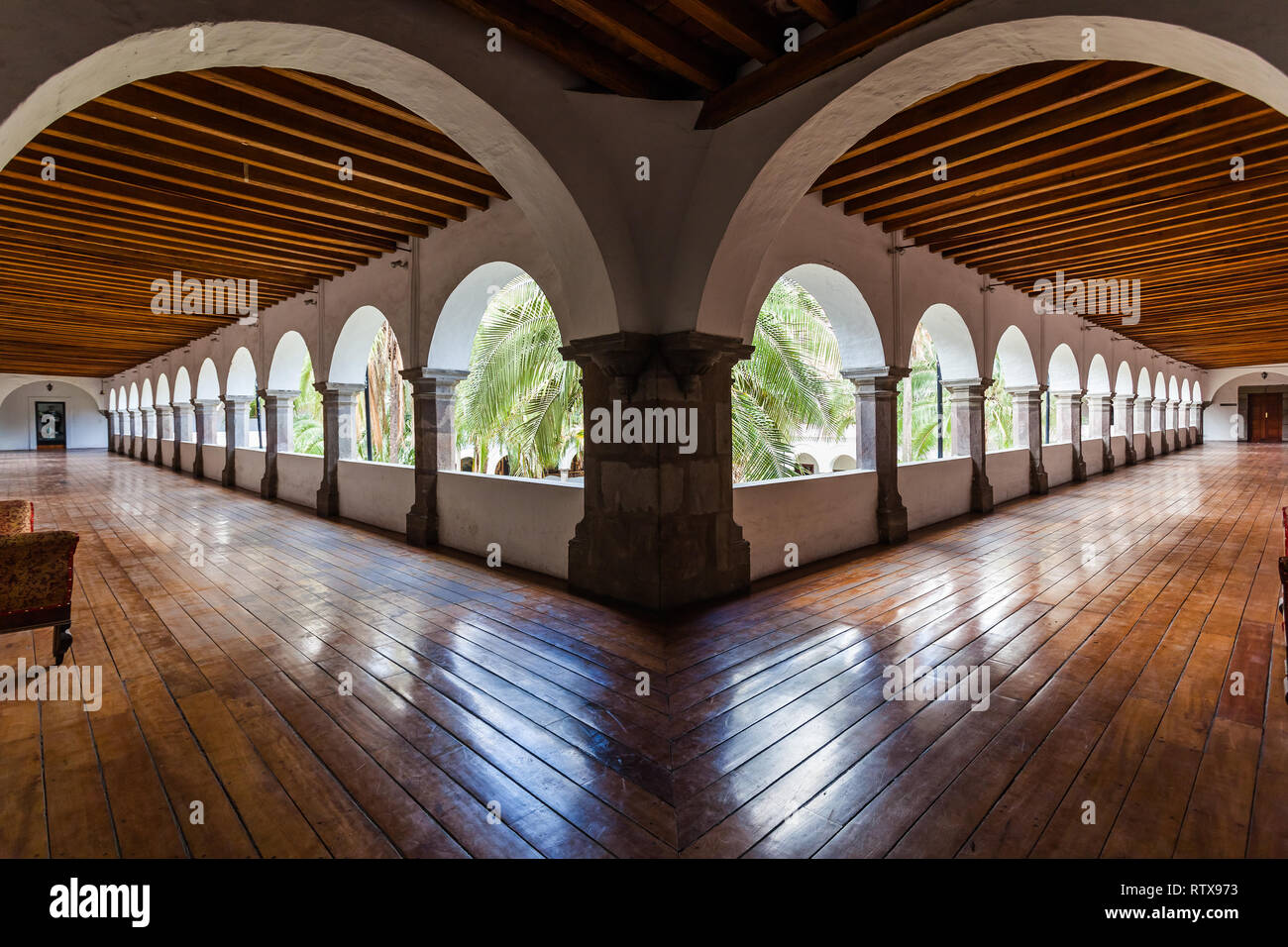 Quito, Ecuador, July 2018: Hallways of the inner courtyard of the Santo ...