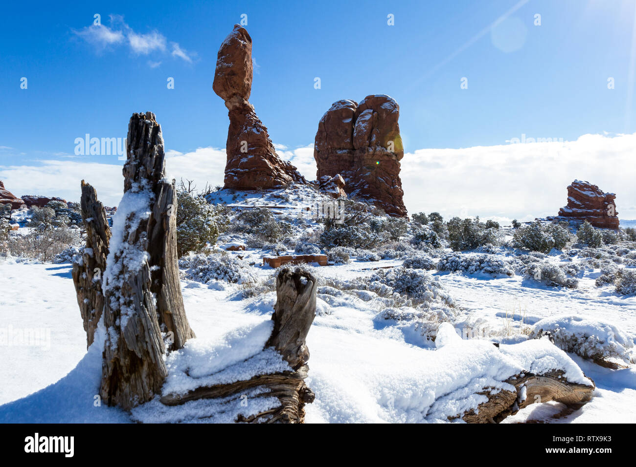 Balanced Rock in Arches National Park early winter with lots of snow on ...