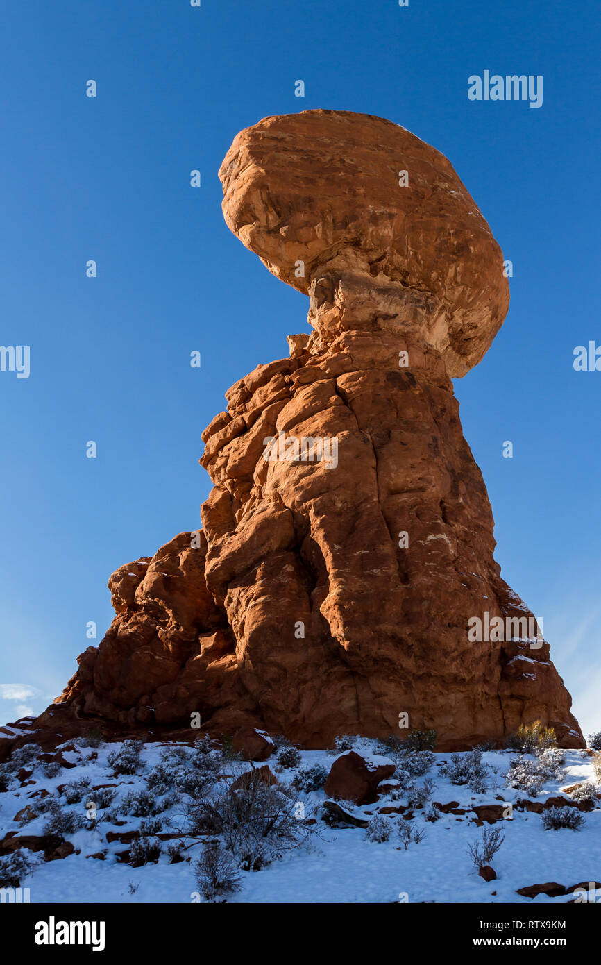 Balanced Rock in Arches National Park early winter with lots of snow on ...