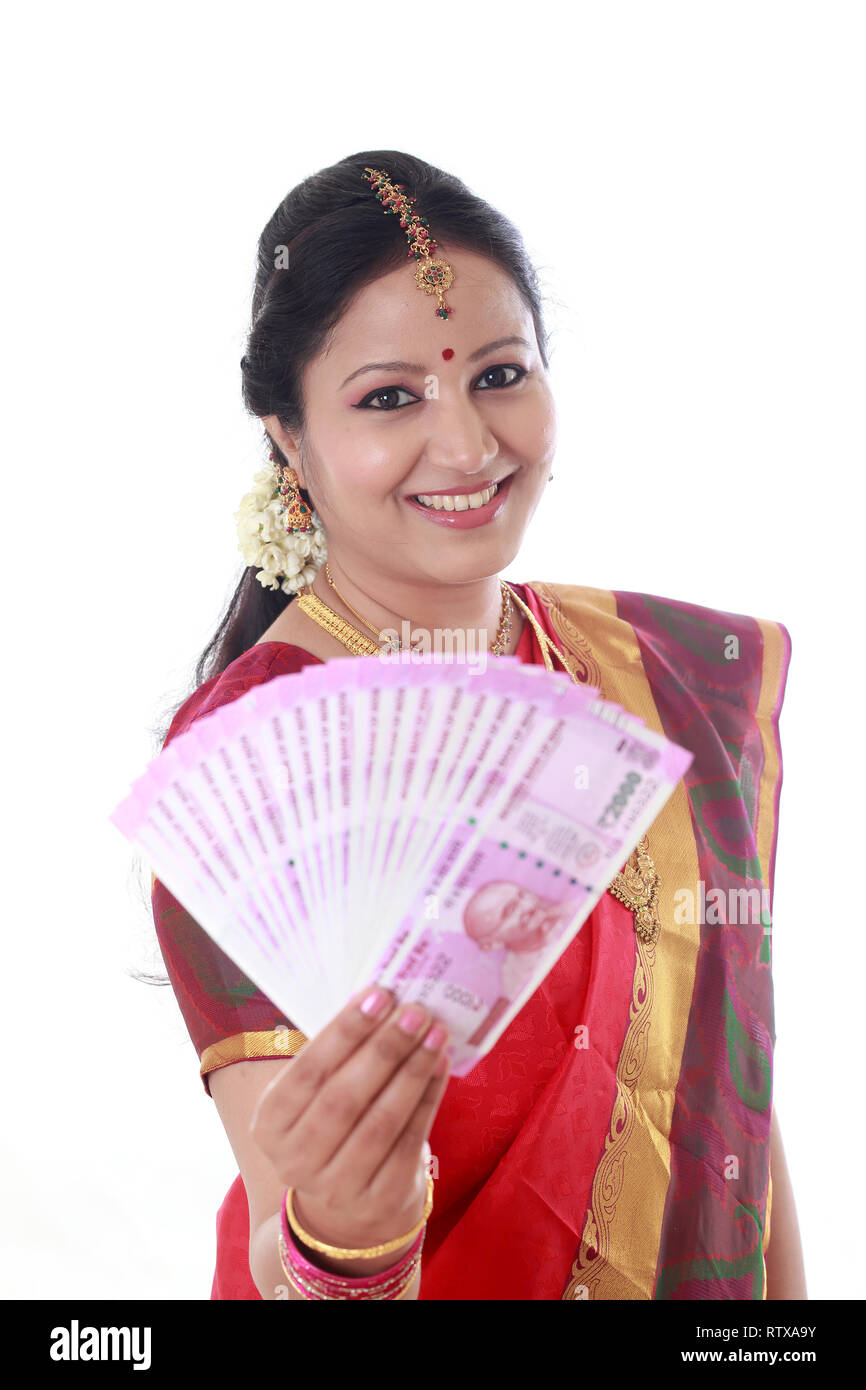 Woman holding indian paper currency hi-res stock photography and images ...