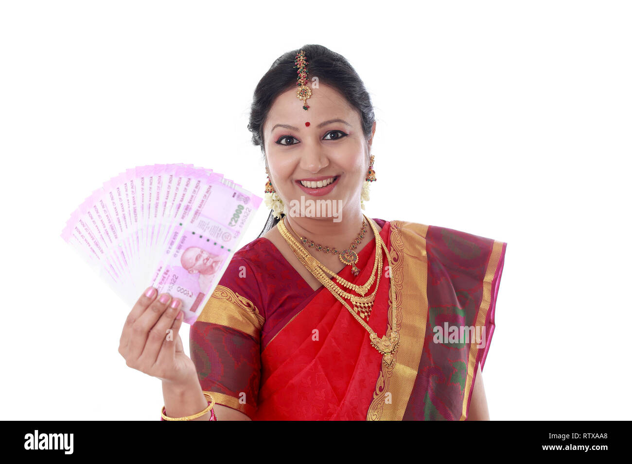 Woman holding indian paper currency hi-res stock photography and images ...