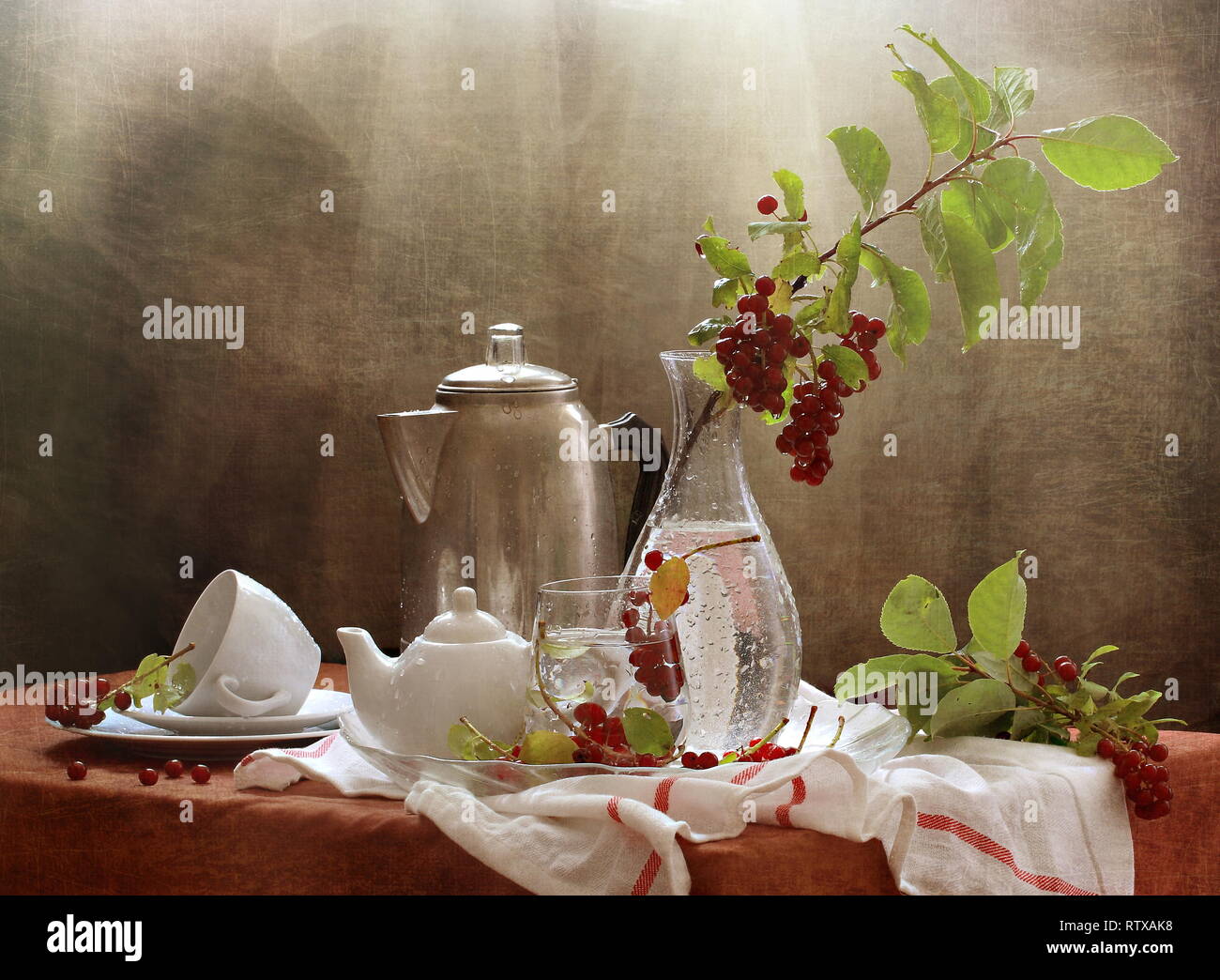 Tea with red bird cherry Stock Photo - Alamy