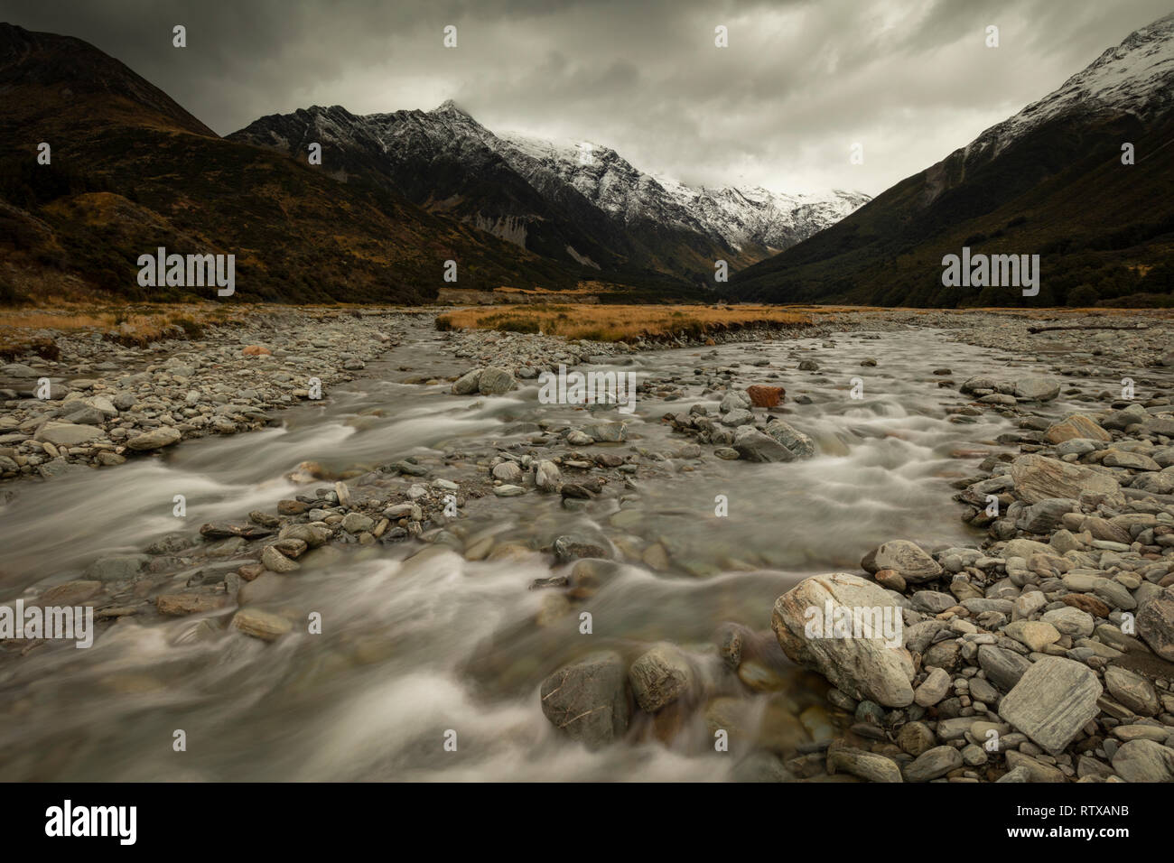 A stream leading down from one of the valley's in the Mount Cook ...