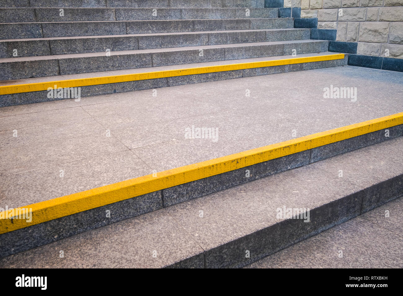 yellow warning line on stairway, urban signage example, Warsaw, Poland ...