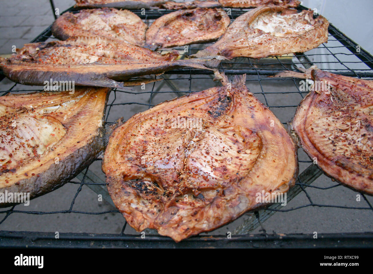 Smoked fish on a farmer's market in Vilnius, Lithuania, ready to eat ...