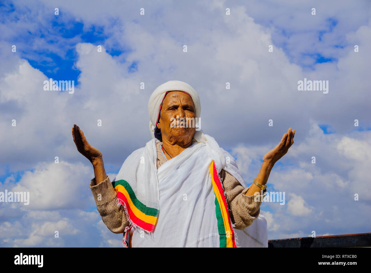 JERUSALEM, ISRAEL - NOVEMBER 11, 2015: An Ethiopian Jewish woman pray ...