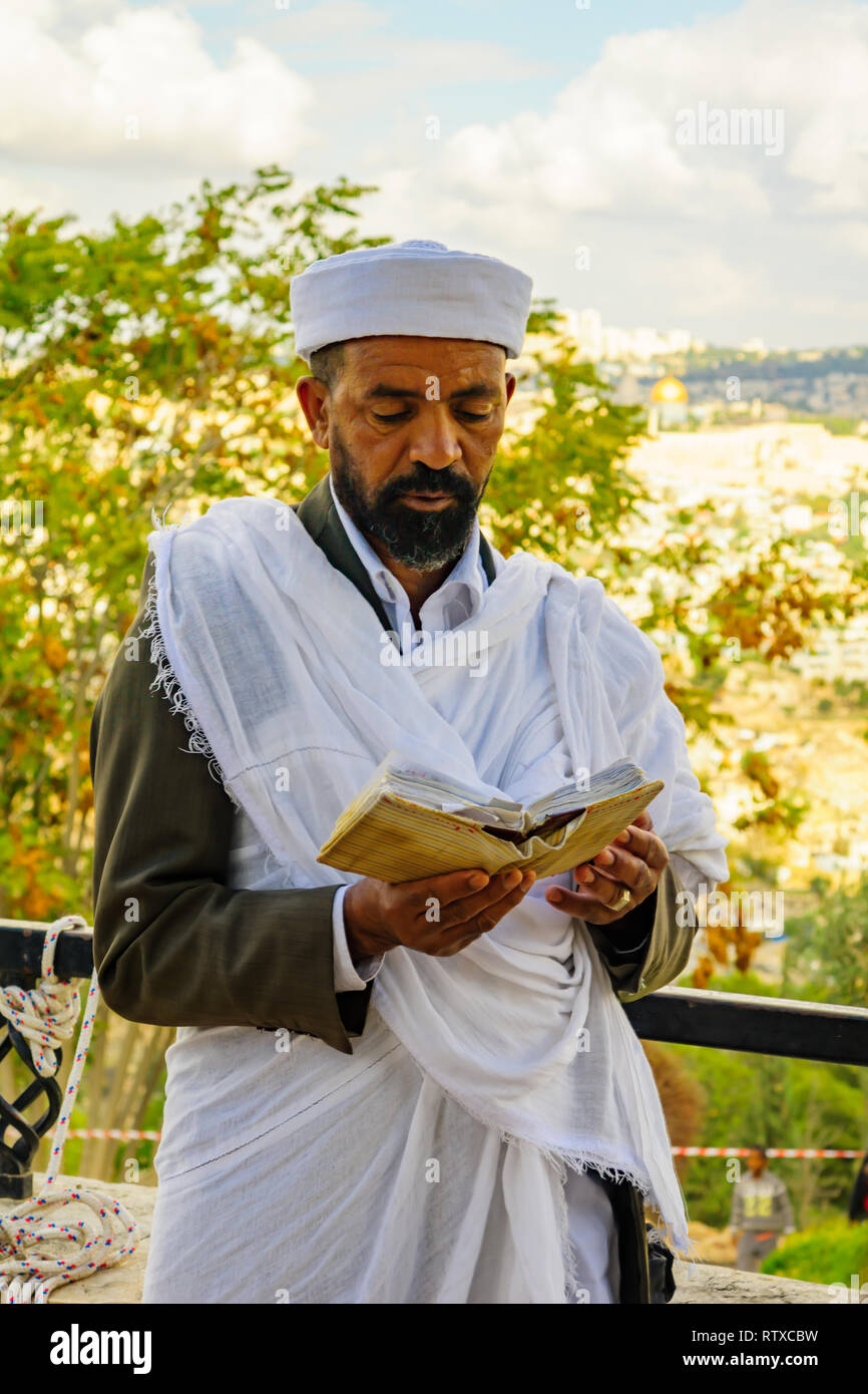 JERUSALEM, ISRAEL - NOVEMBER 11, 2015: An Ethiopian Jewish man pray at ...