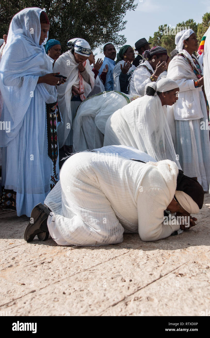 JERUSALEM - OCT 31: Ethiopian Jewish women kneel in pray at the Sigd ...