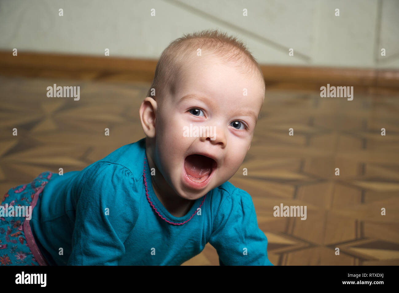 funny laughing child with mouth wide open Stock Photo - Alamy
