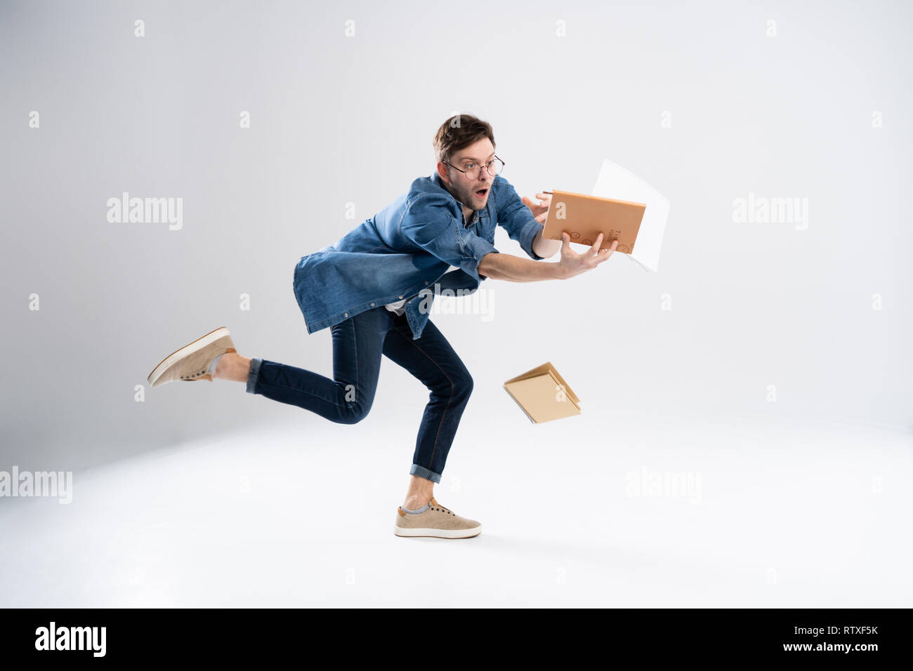 Dropped book hi-res stock photography and images - Alamy