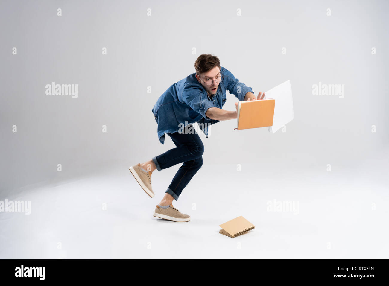Dropped book hi-res stock photography and images - Alamy