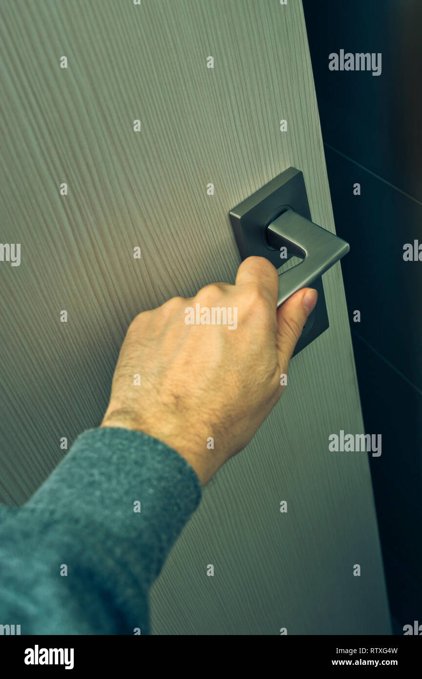 male hand opening a door Stock Photo - Alamy