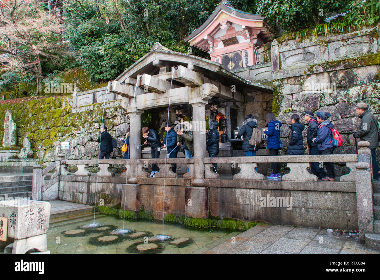 Three channels of water from the Otowa waterfall at the Kiyomizu Temple ...