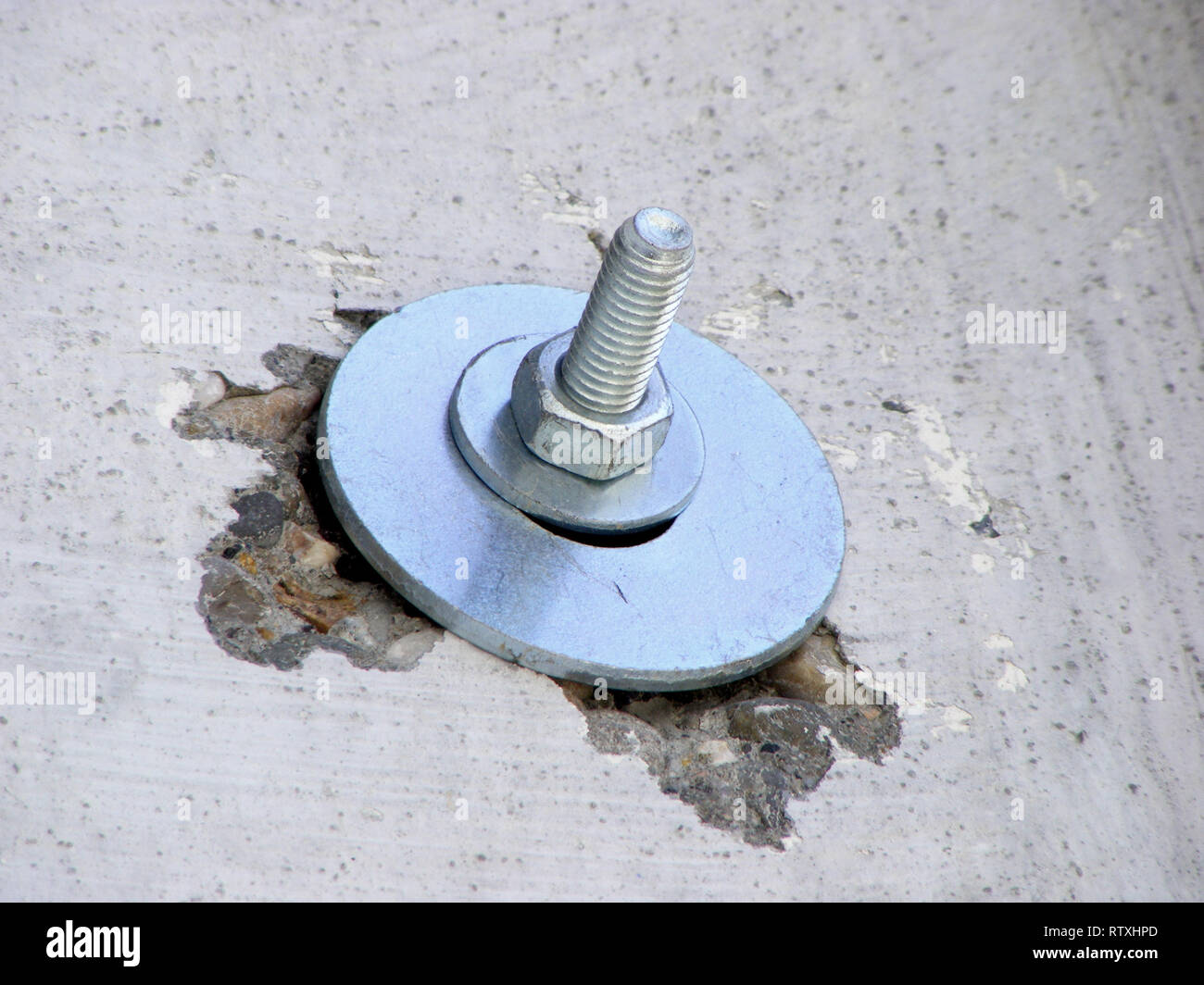 wall mounting with bolt, washer and nut Stock Photo - Alamy