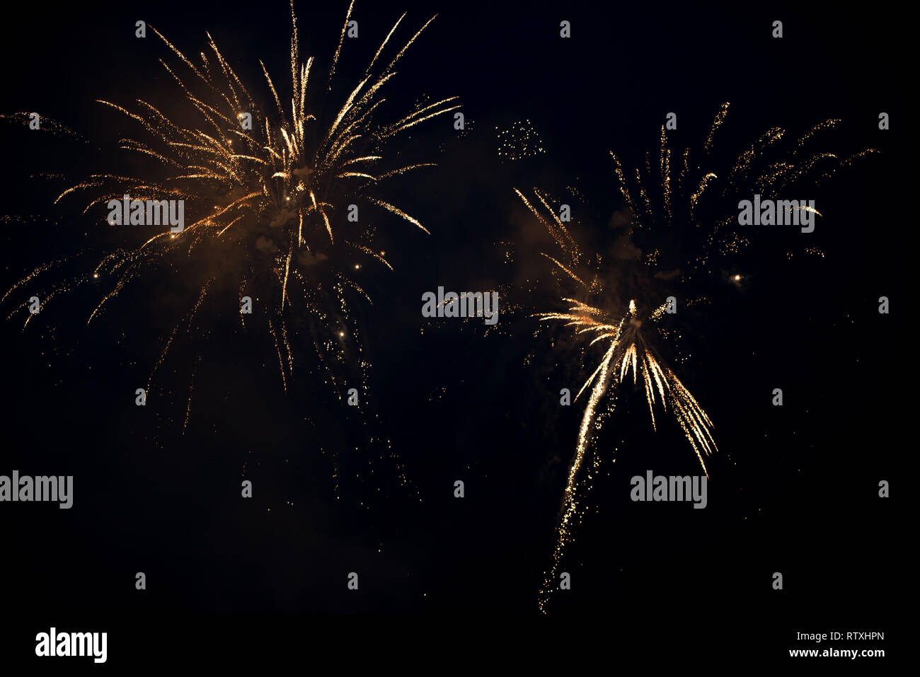 Two bright colorful fireworks explosion in the sky. Beautiful ...