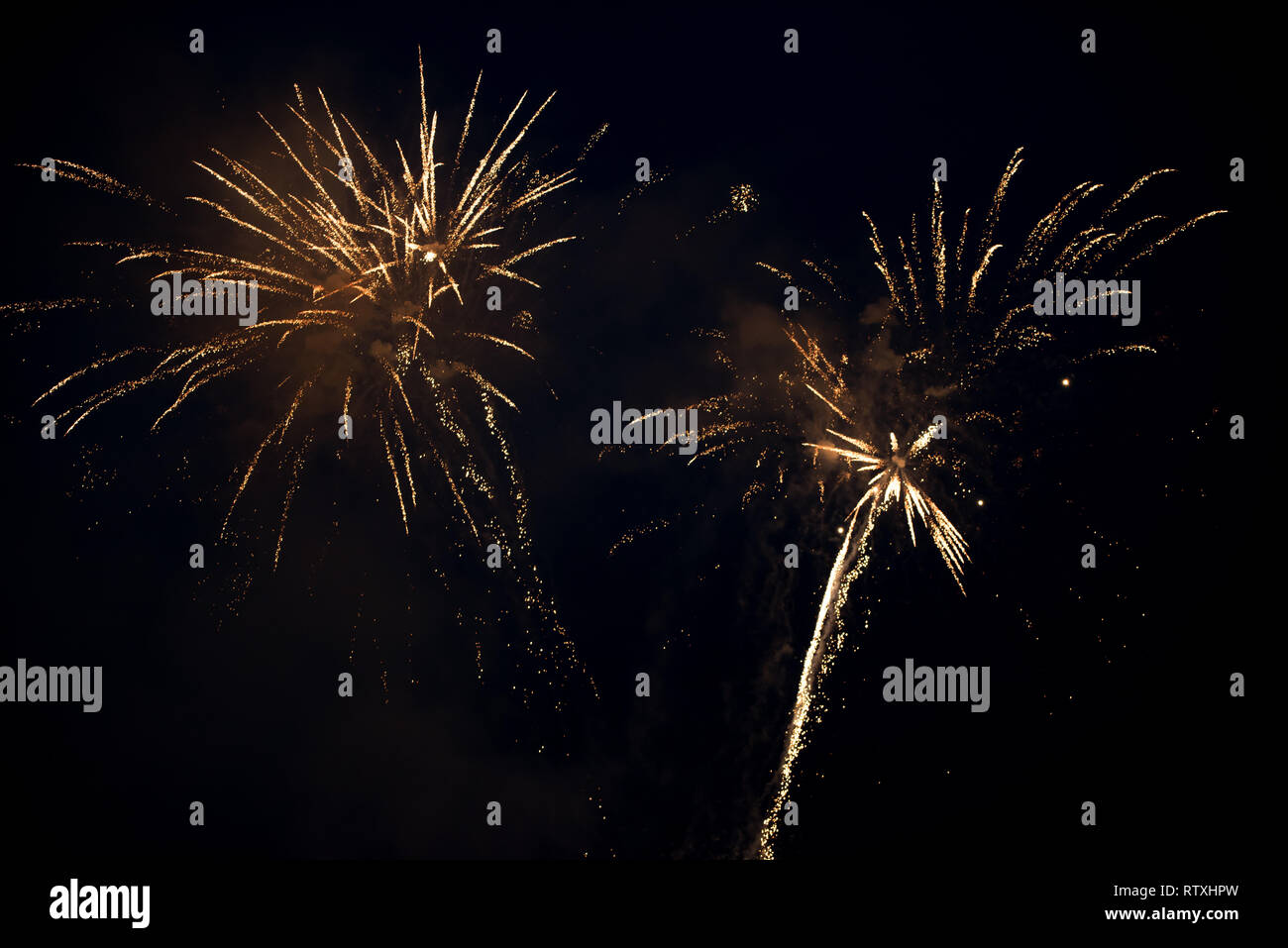 Two bright colorful fireworks explosion in the sky. Beautiful ...