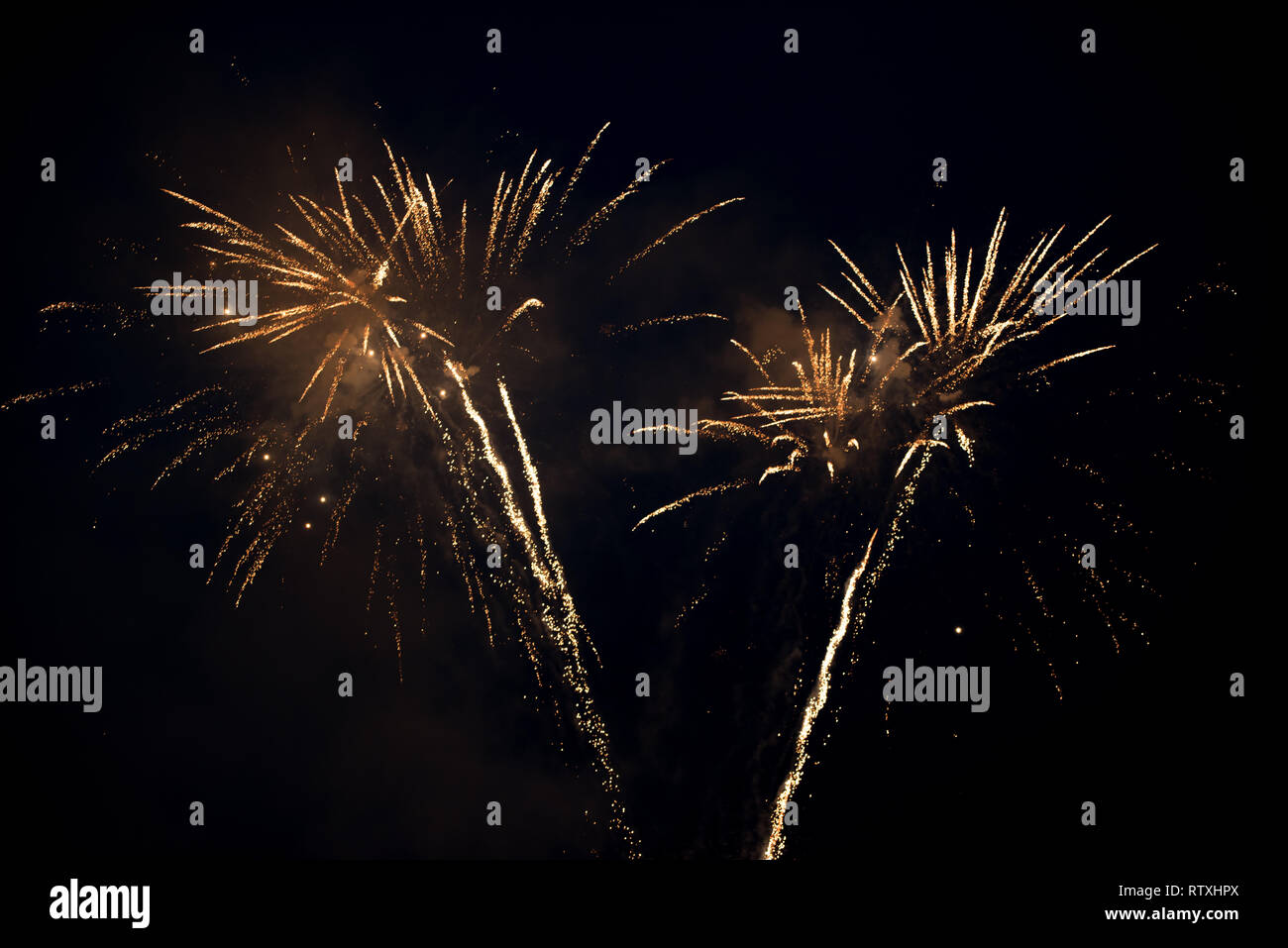 Two bright colorful fireworks explosion in the sky. Beautiful ...