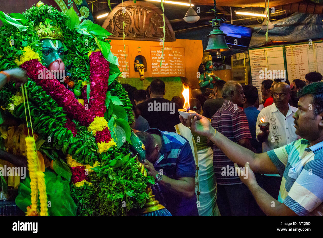 Worshipers Offering Prayers to Hindu God Hanuman, Decorated with ...