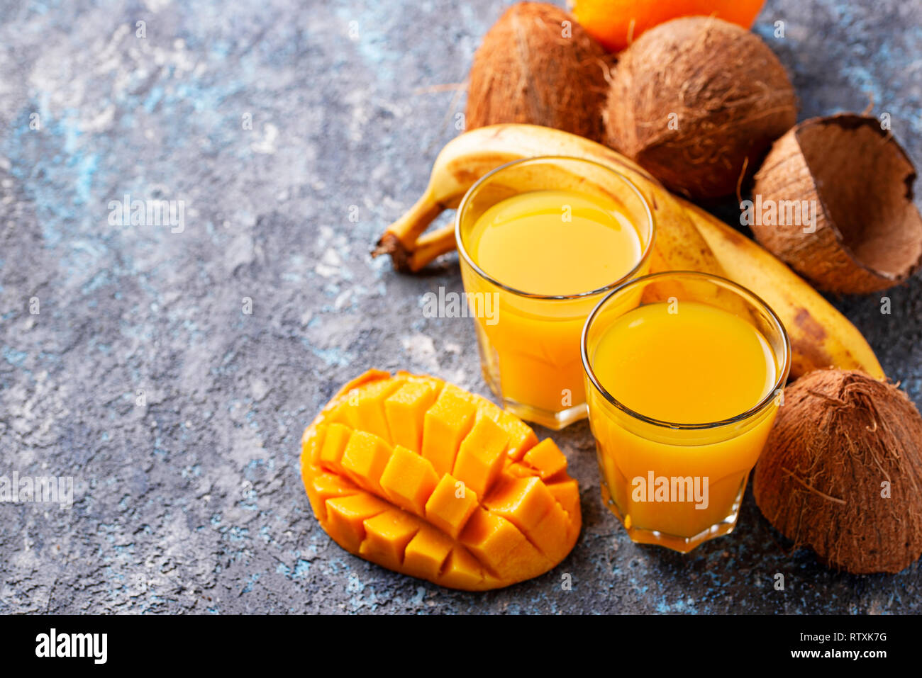 Fresh tropical mix fruit juice Stock Photo - Alamy