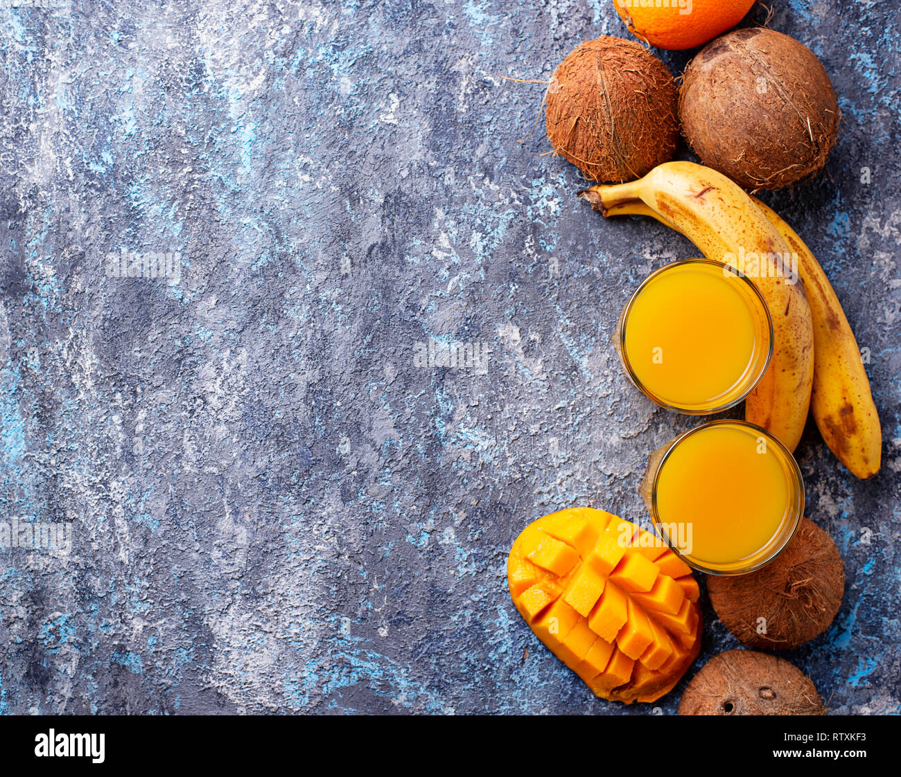 Fresh tropical mix fruit juice Stock Photo - Alamy