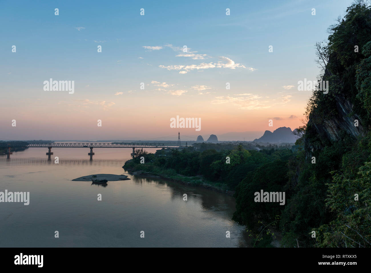 Wide angle picture of Bat Cave and Thanlwin Bridge over the river ...