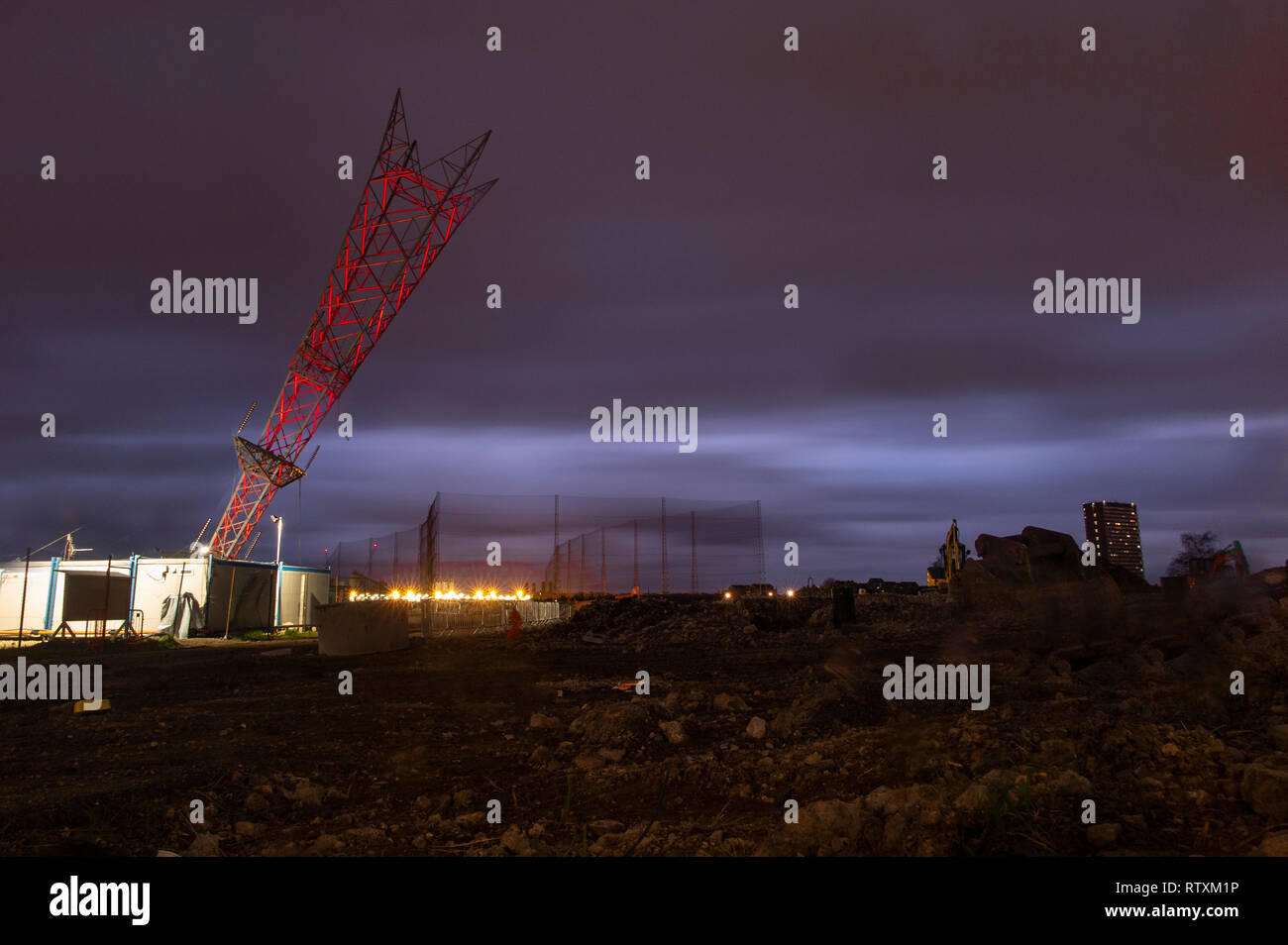 n electricity pylon appears to have dropped from the sky onto wasteland ...
