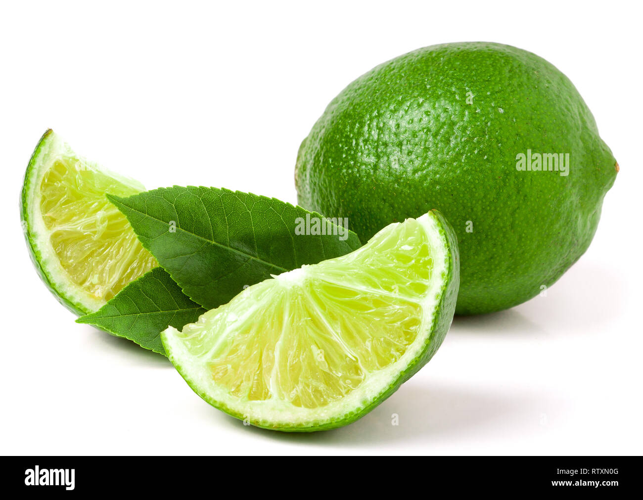 lime with slices and leaf isolated on white background Stock Photo - Alamy