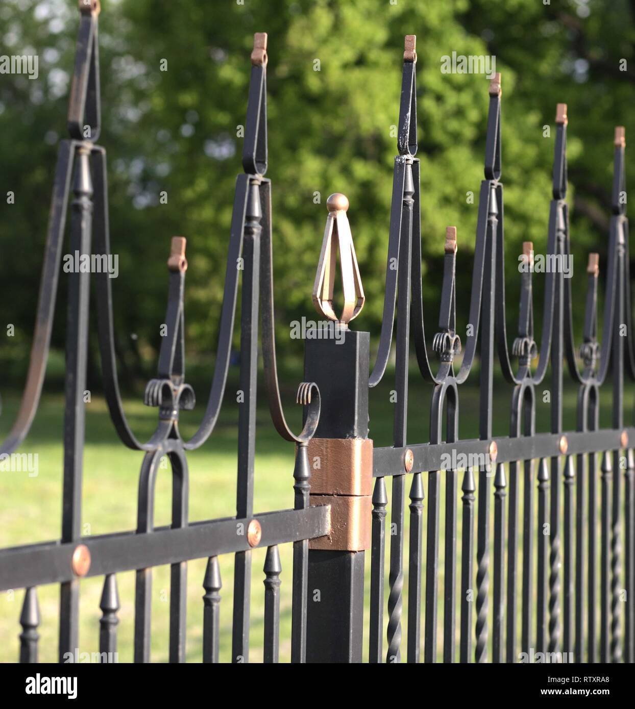 fence with gold decoration at day Stock Photo - Alamy