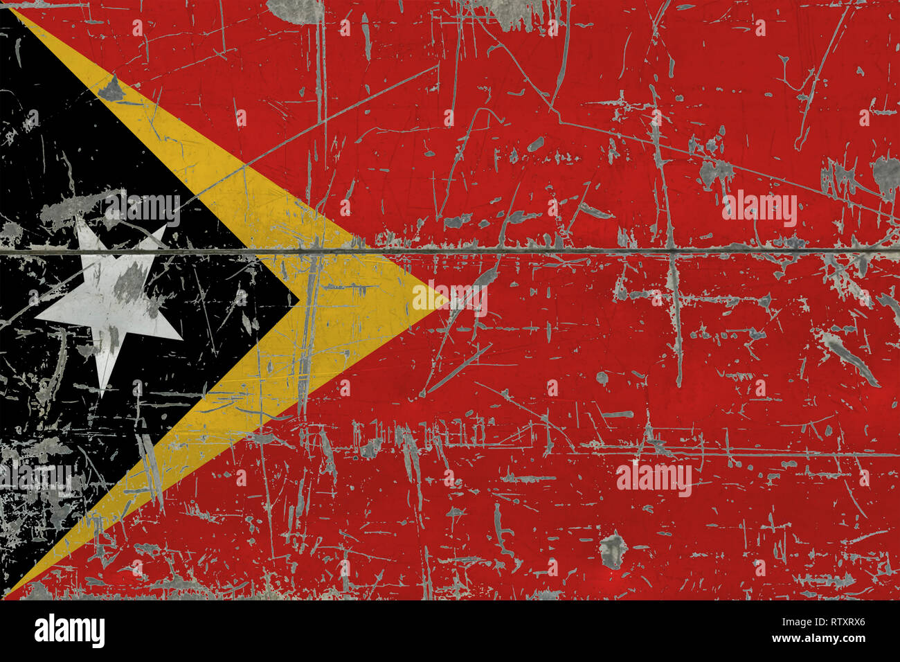 Grunge East Timor flag on old scratched wooden surface. National ...