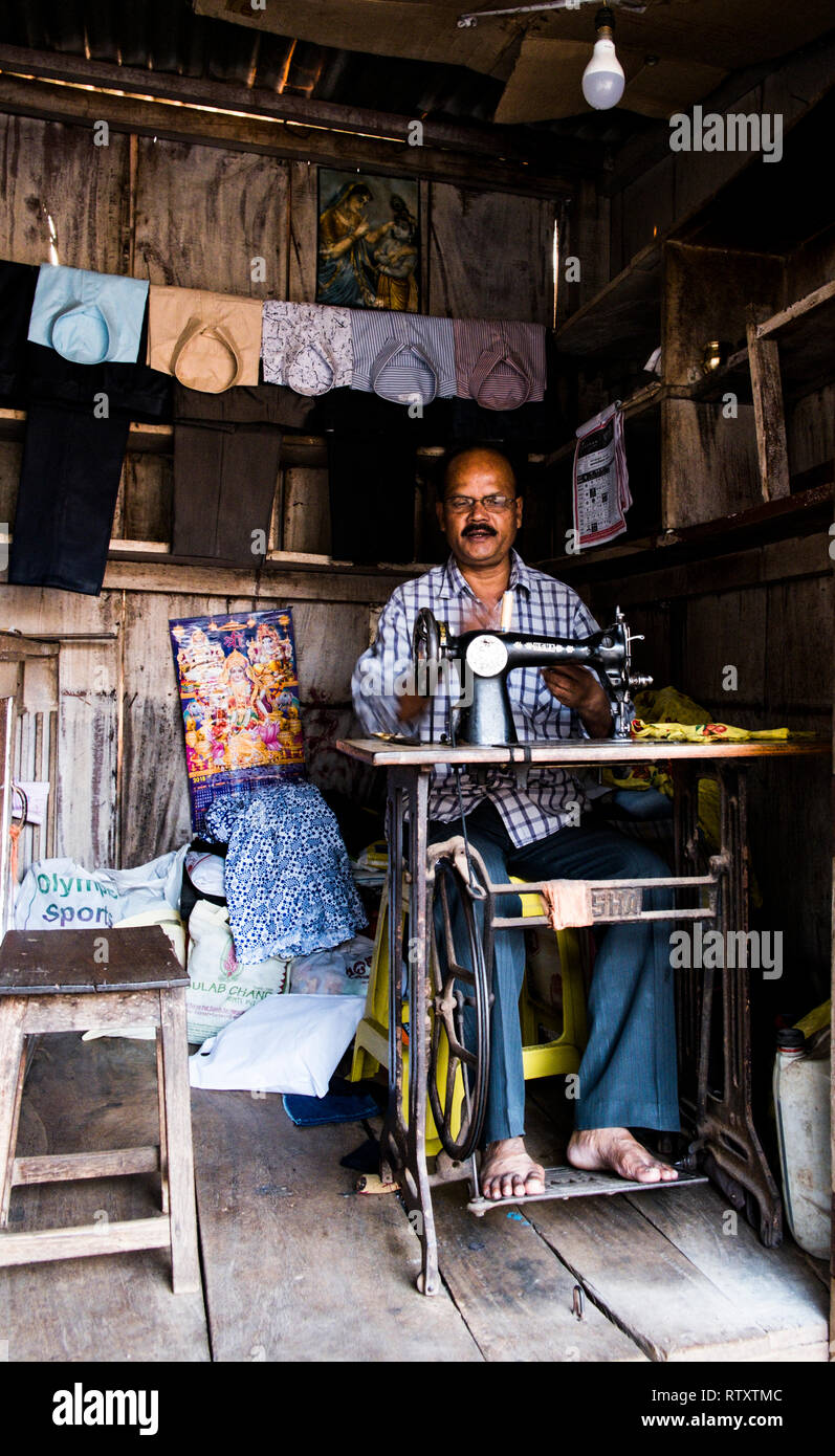 Tailor old man sewing hi-res stock photography and images - Alamy