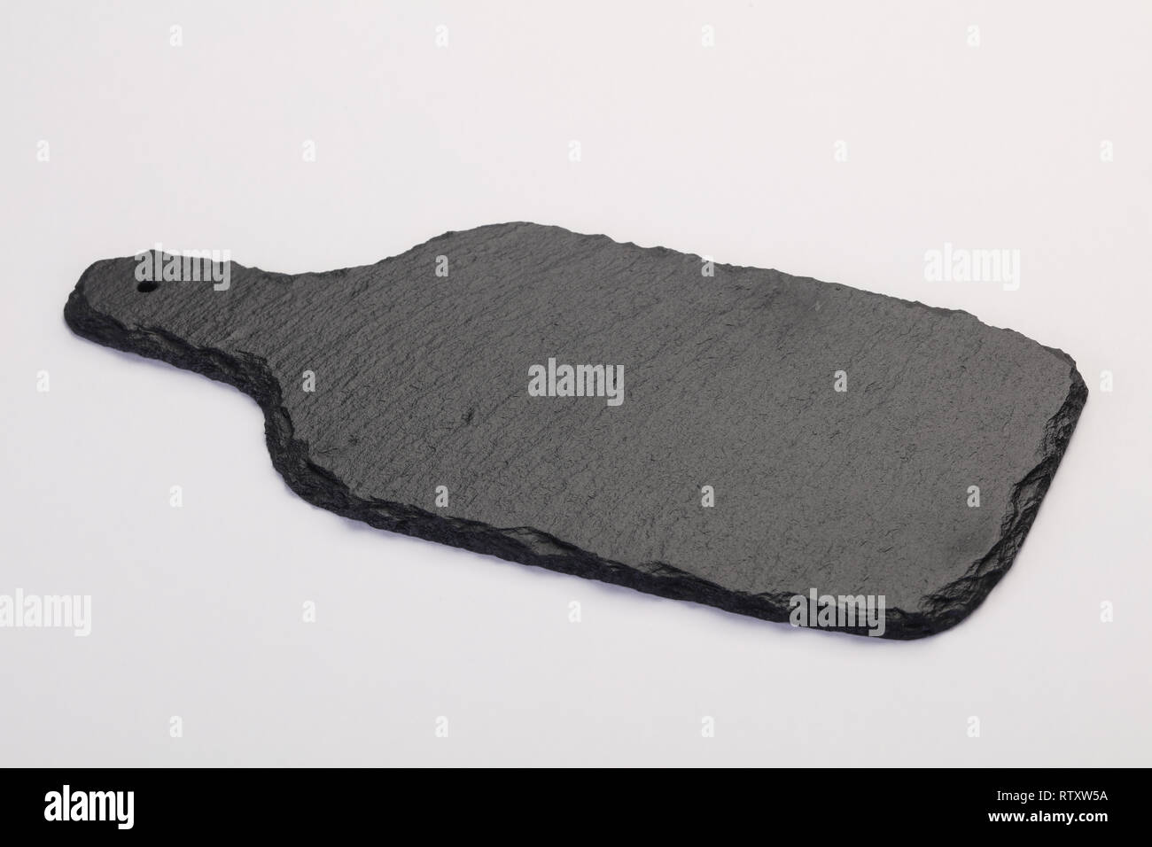 Stone board for serving dishes - kitchenware Stock Photo - Alamy