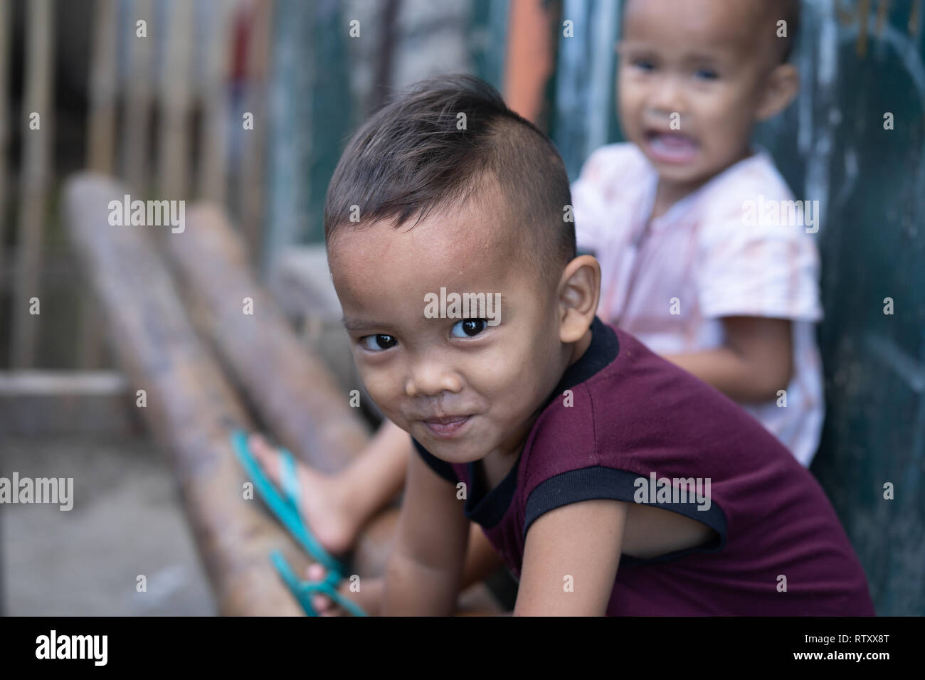 Street Portrait of a young Filipino boy within a slum area,Cebu City ...