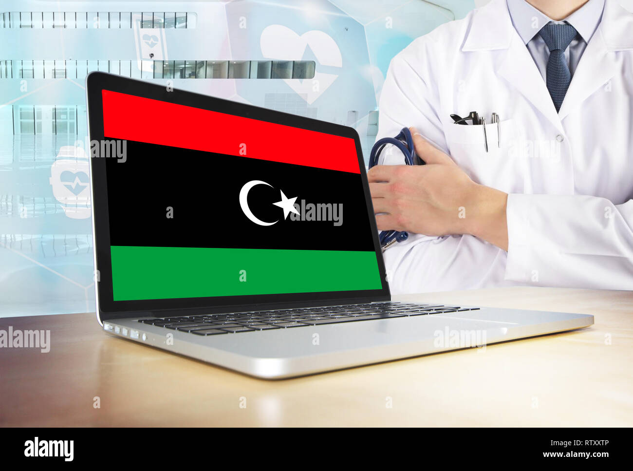 Libya healthcare system in tech theme. Libyan flag on computer screen ...