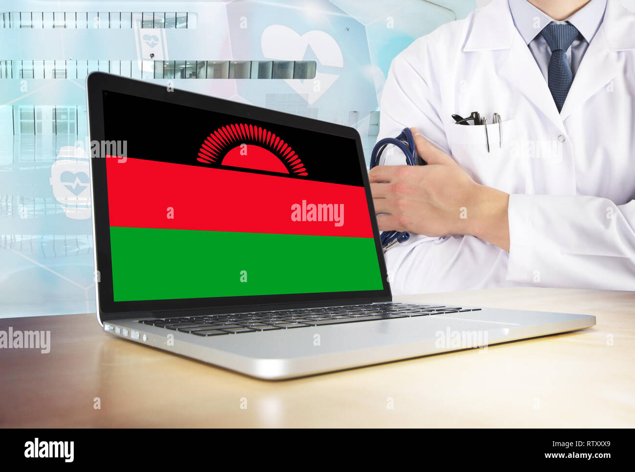Malawi healthcare system in tech theme. Malawian flag on computer ...