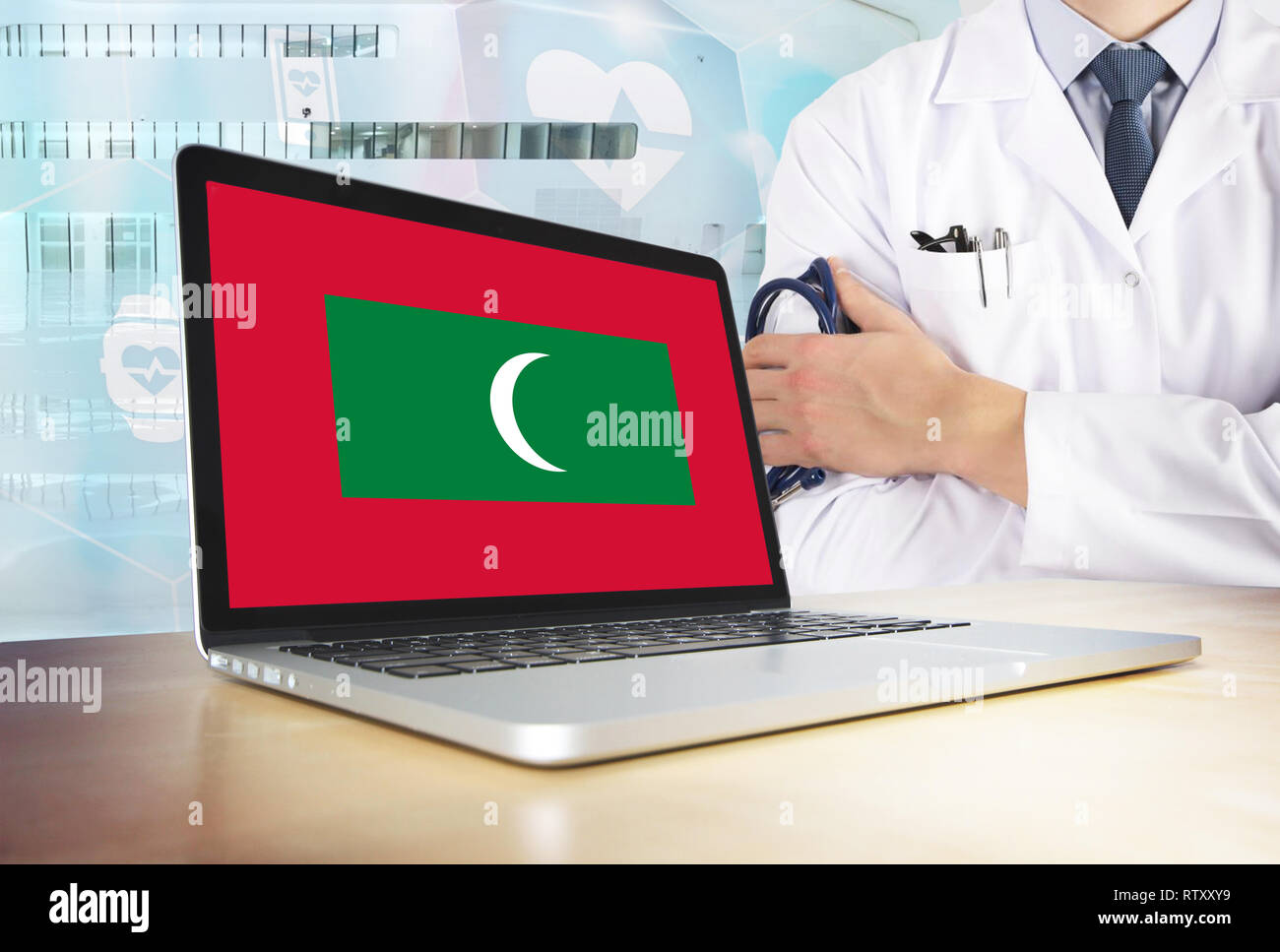 Maldives healthcare system in tech theme. Maldivan flag on computer ...