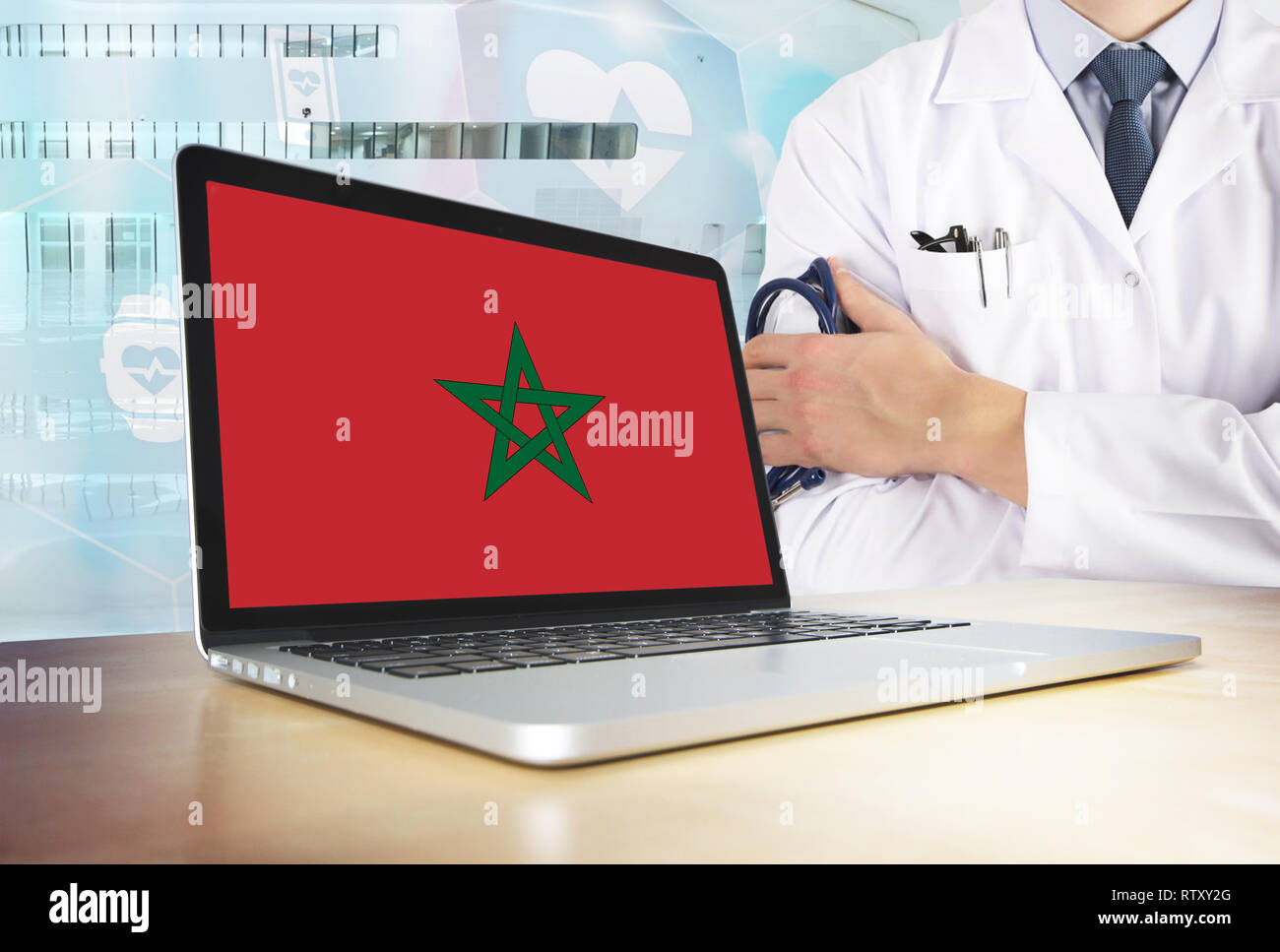Morocco healthcare system in tech theme. Moroccan flag on computer ...