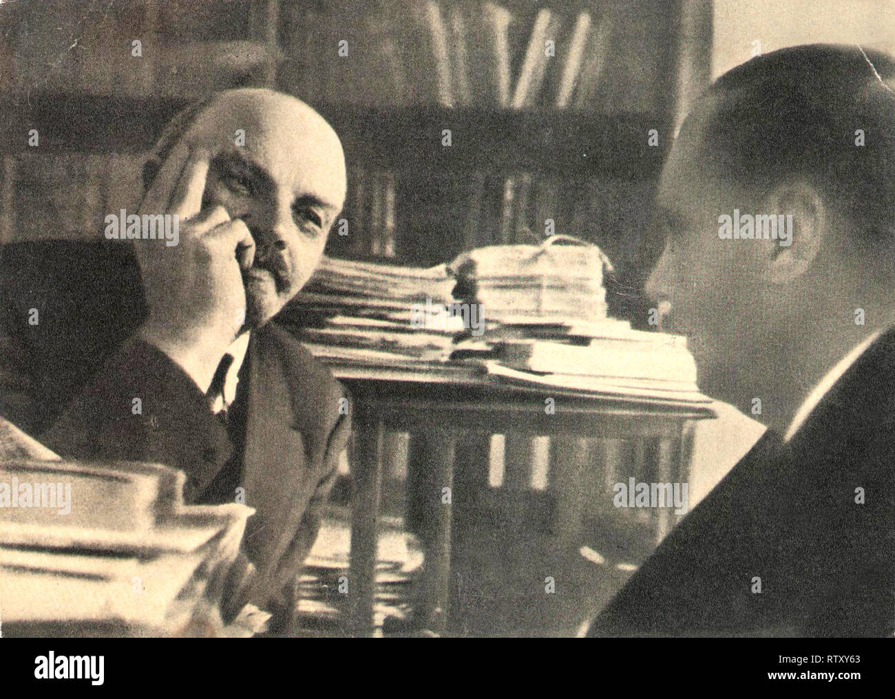 Lenin V.I. in his office in the Kremlin speaks with the English writer ...