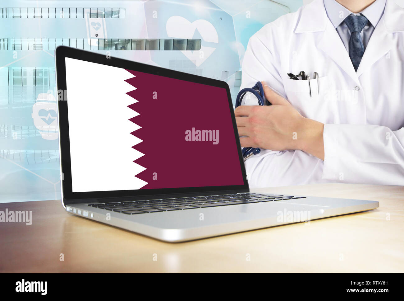 Qatar healthcare system in tech theme. Qatari flag on computer screen ...