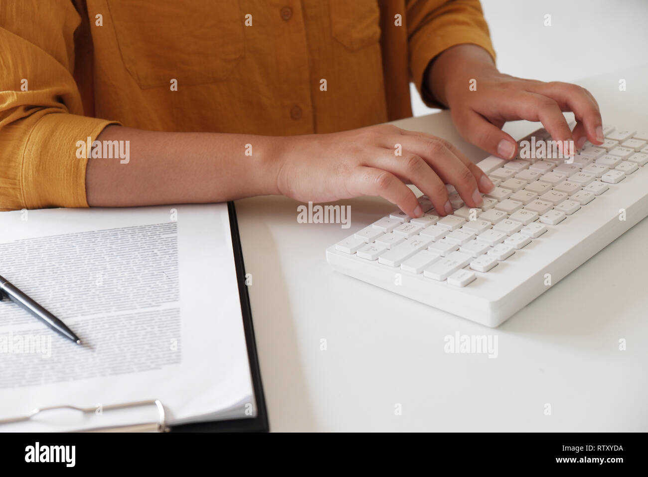Close-up of female hands. typing in her office Stock Photo - Alamy