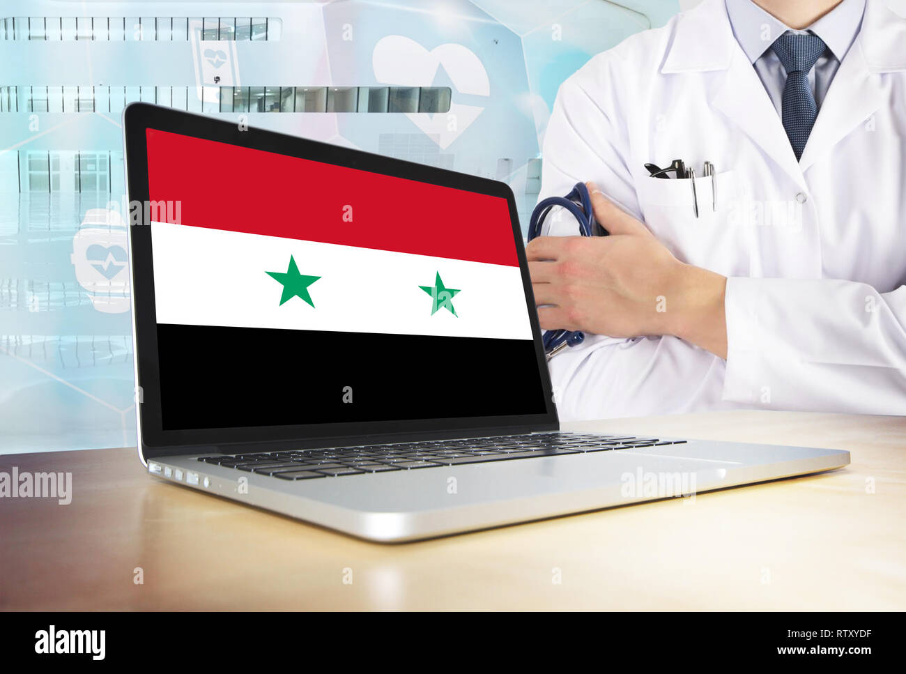 Syria healthcare system in tech theme. Syrian flag on computer screen ...