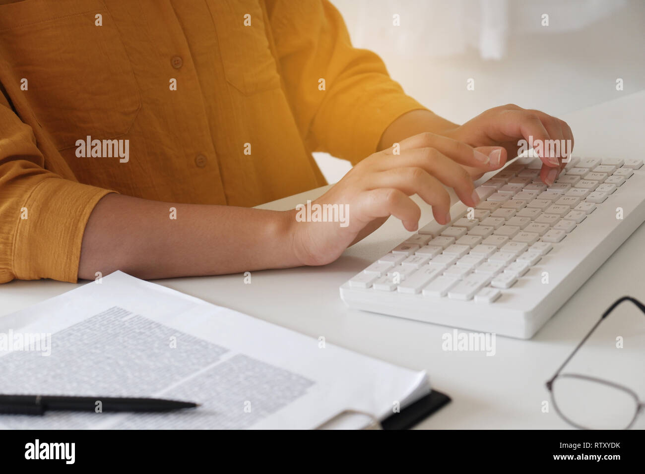 Close-up of female hands. typing in her office Stock Photo - Alamy